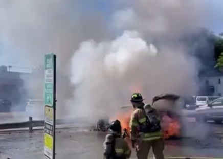 Watch: Tesla car fire takes 42 minutes and 25,000 gallons of water to ...