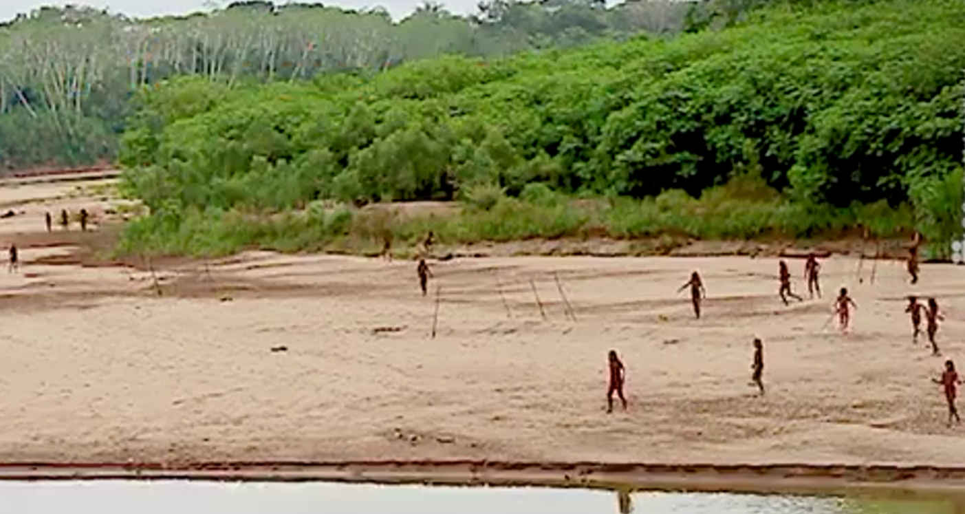 Uncontacted Amazon tribe photographed on remote Peruvian river bank ...
