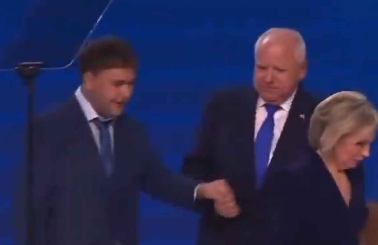 Video surfaces of Walz aggressively yanking arm of his special needs ...