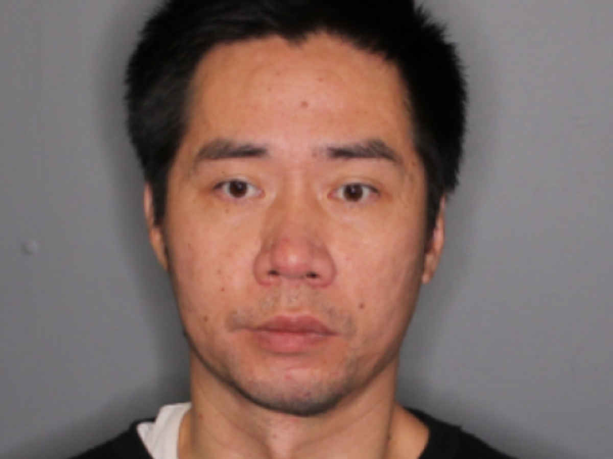 Warrant to arrest: Jin Zhong - Daily Telegraph NZ
